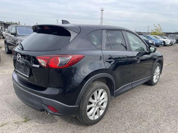 Melns Mazda CX-5 2013 Panevēža, ar dzinēja tilpumu 2.19 L un nobraukumu 207 tūkst. km par 5750 €, foto 5 vietnē AUTOMOTO.COM.LV