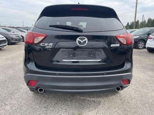 Black Mazda CX-5 2013 in Panevezys, with an engine capacity of 2.19 L and mileage of 207 thousand km for 5750 €, photo 6 on AUTOMOTO.COM.LV