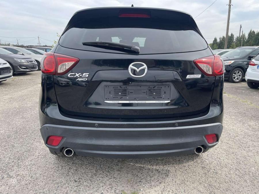 Black Mazda CX-5 2013 in Panevezys, with an engine capacity of 2.19 L and mileage of 207 thousand km for 5750 €, photo 6 on AUTOMOTO.COM.LV