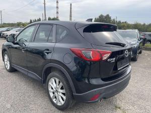 Black Mazda CX-5 2013 in Panevezys, with an engine capacity of 2.19 L and mileage of 207 thousand km for 5750 €, photo 7 on AUTOMOTO.COM.LV