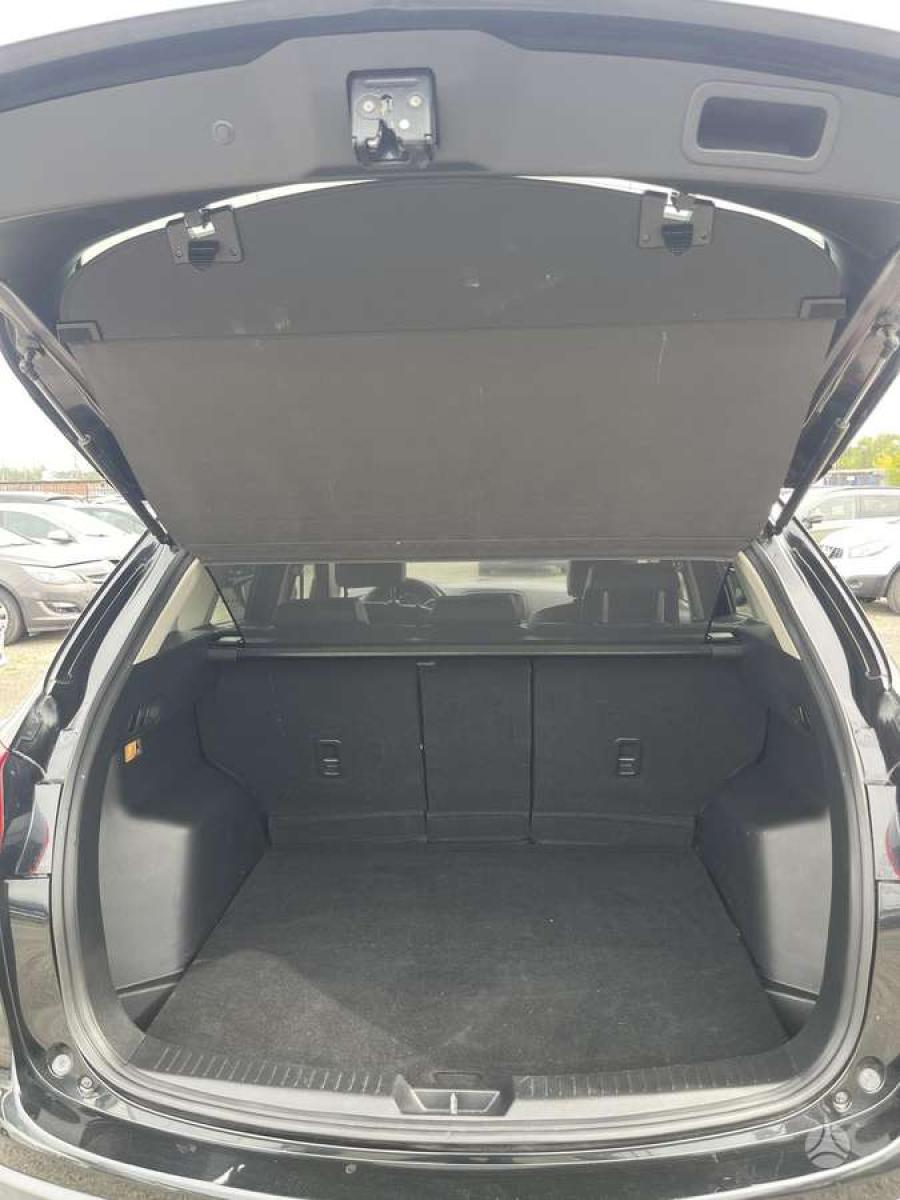 Black Mazda CX-5 2013 in Panevezys, with an engine capacity of 2.19 L and mileage of 207 thousand km for 5750 €, photo 8 on AUTOMOTO.COM.LV