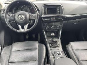 Black Mazda CX-5 2013 in Panevezys, with an engine capacity of 2.19 L and mileage of 207 thousand km for 5750 €, photo 10 on AUTOMOTO.COM.LV