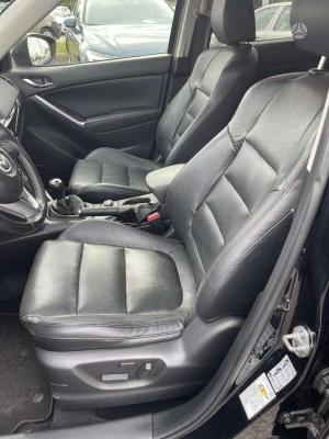 Black Mazda CX-5 2013 in Panevezys, with an engine capacity of 2.19 L and mileage of 207 thousand km for 5750 €, photo 11 on AUTOMOTO.COM.LV