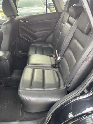 Black Mazda CX-5 2013 in Panevezys, with an engine capacity of 2.19 L and mileage of 207 thousand km for 5750 €, photo 12 on AUTOMOTO.COM.LV