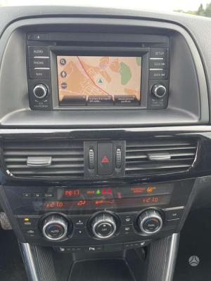 Black Mazda CX-5 2013 in Panevezys, with an engine capacity of 2.19 L and mileage of 207 thousand km for 5750 €, photo 14 on AUTOMOTO.COM.LV