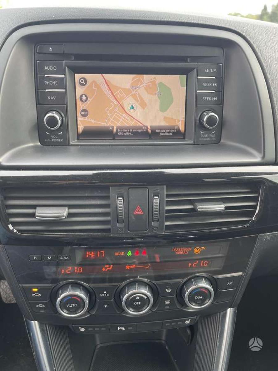 Black Mazda CX-5 2013 in Panevezys, with an engine capacity of 2.19 L and mileage of 207 thousand km for 5750 €, photo 14 on AUTOMOTO.COM.LV
