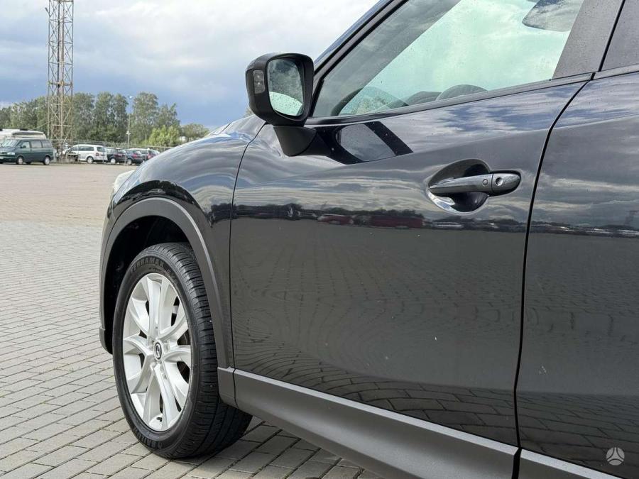 Black Mazda CX-5 2013 in Marijampole, with an engine capacity of 2.19 L and mileage of 226 thousand km for 5500 €, photo 3 on AUTOMOTO.COM.LV
