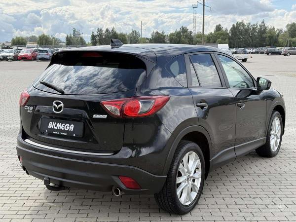 Black Mazda CX-5 2013 in Marijampole, with an engine capacity of 2.19 L and mileage of 226 thousand km for 5500 €, photo 7 on AUTOMOTO.COM.LV