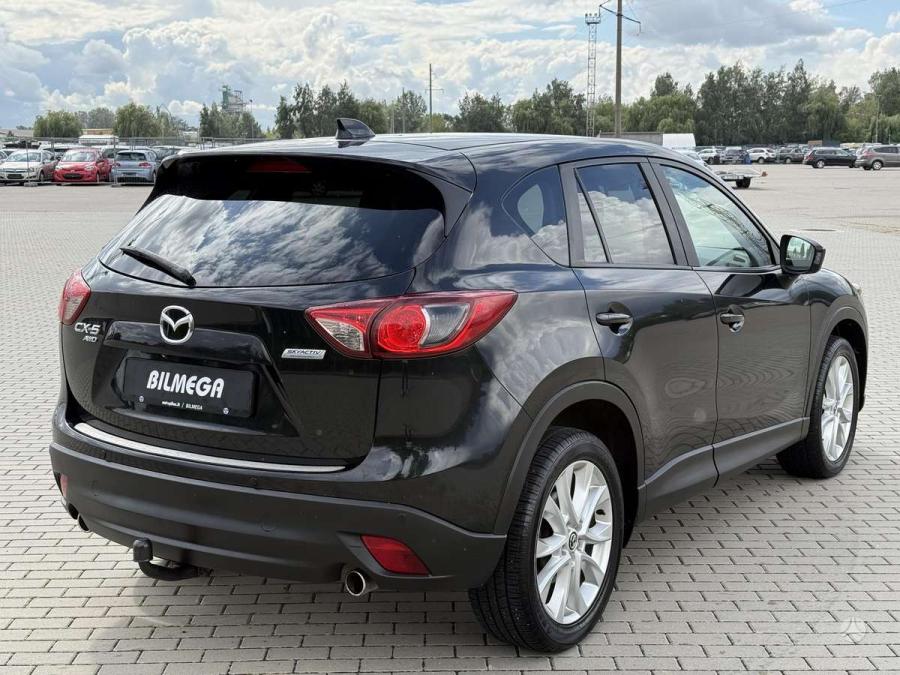 Black Mazda CX-5 2013 in Marijampole, with an engine capacity of 2.19 L and mileage of 226 thousand km for 5500 €, photo 7 on AUTOMOTO.COM.LV