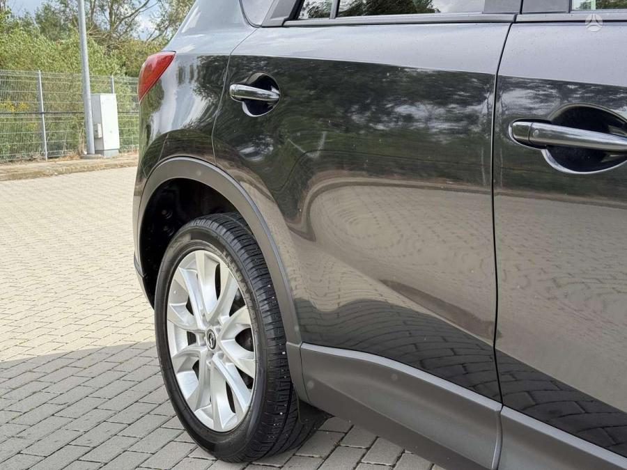Black Mazda CX-5 2013 in Marijampole, with an engine capacity of 2.19 L and mileage of 226 thousand km for 5500 €, photo 11 on AUTOMOTO.COM.LV