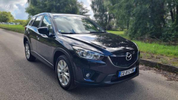 Melns Mazda CX-5 2013 Tauragė, ar dzinēja tilpumu 2.19 L un nobraukumu 151 tūkst. km par 6900 €, foto 1 vietnē AUTOMOTO.COM.LV