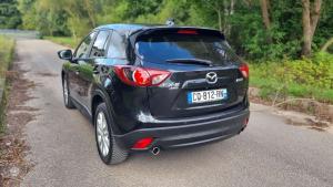 Melns Mazda CX-5 2013 Tauragė, ar dzinēja tilpumu 2.19 L un nobraukumu 151 tūkst. km par 6900 €, foto 4 vietnē AUTOMOTO.COM.LV