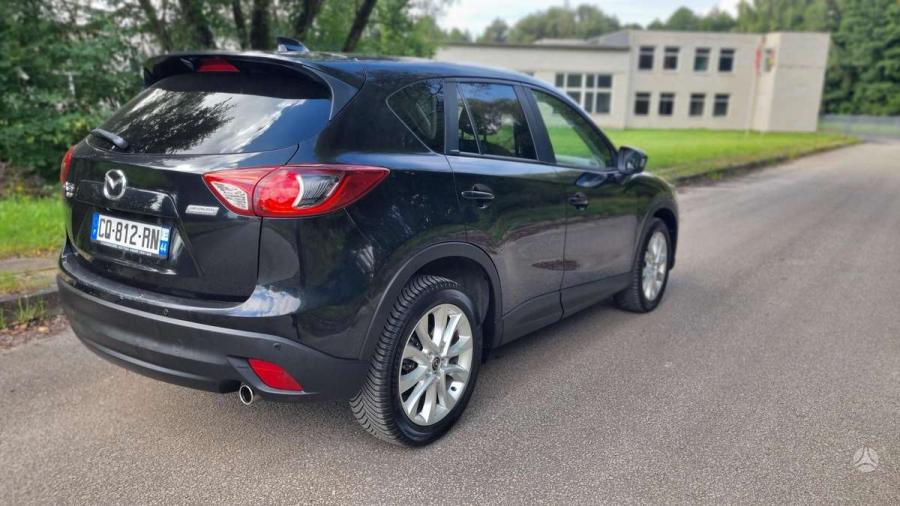 Melns Mazda CX-5 2013 Tauragė, ar dzinēja tilpumu 2.19 L un nobraukumu 151 tūkst. km par 6900 €, foto 5 vietnē AUTOMOTO.COM.LV