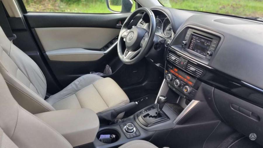Melns Mazda CX-5 2013 Tauragė, ar dzinēja tilpumu 2.19 L un nobraukumu 151 tūkst. km par 6900 €, foto 6 vietnē AUTOMOTO.COM.LV