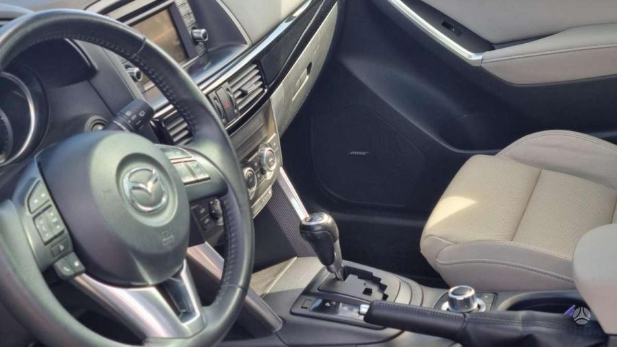 Melns Mazda CX-5 2013 Tauragė, ar dzinēja tilpumu 2.19 L un nobraukumu 151 tūkst. km par 6900 €, foto 7 vietnē AUTOMOTO.COM.LV