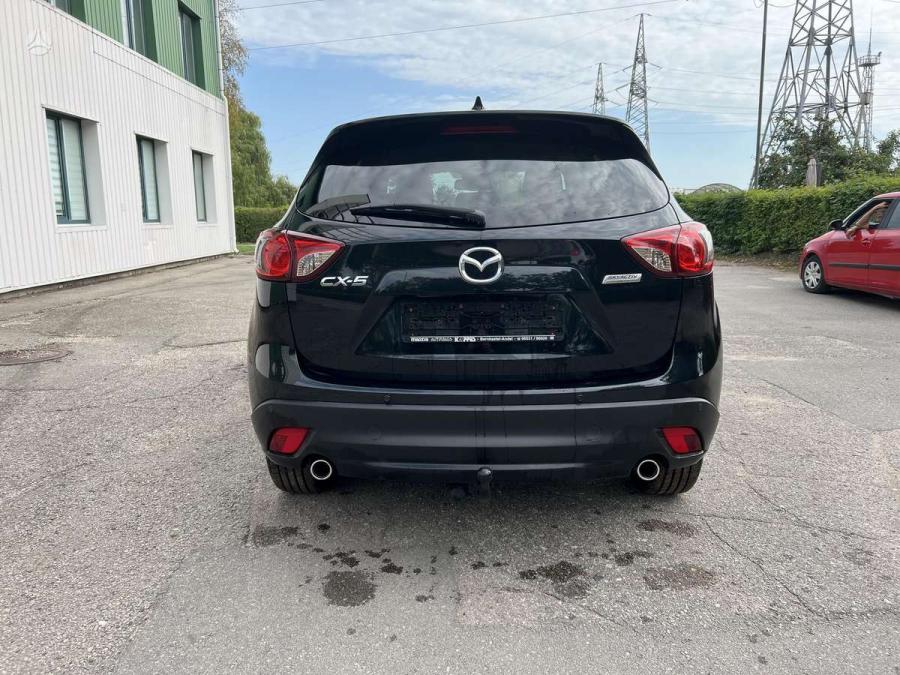Melns Mazda CX-5 2013 Kelmė, ar dzinēja tilpumu 2.19 L un nobraukumu 180 tūkst. km par 6200 €, foto 8 vietnē AUTOMOTO.COM.LV