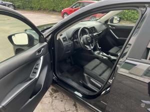 Melns Mazda CX-5 2013 Kelmė, ar dzinēja tilpumu 2.19 L un nobraukumu 180 tūkst. km par 6200 €, foto 10 vietnē AUTOMOTO.COM.LV
