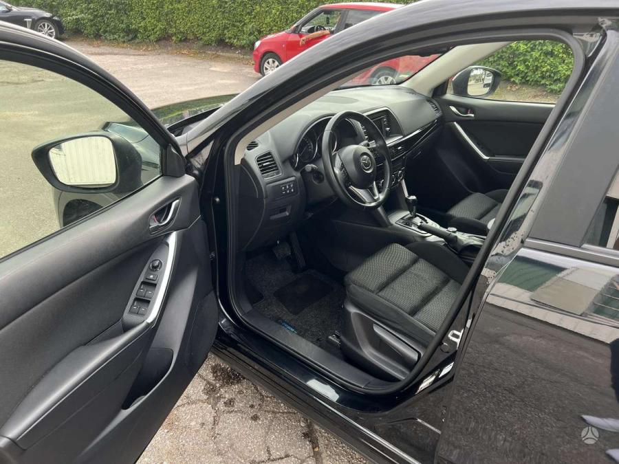 Melns Mazda CX-5 2013 Kelmė, ar dzinēja tilpumu 2.19 L un nobraukumu 180 tūkst. km par 6200 €, foto 10 vietnē AUTOMOTO.COM.LV