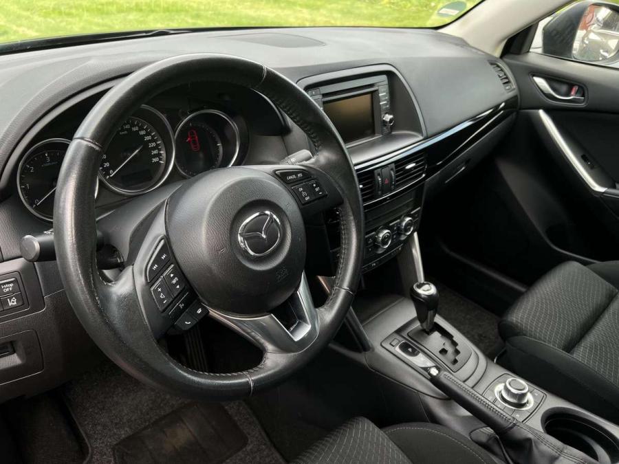 Melns Mazda CX-5 2013 Kelmė, ar dzinēja tilpumu 2.19 L un nobraukumu 180 tūkst. km par 6200 €, foto 12 vietnē AUTOMOTO.COM.LV