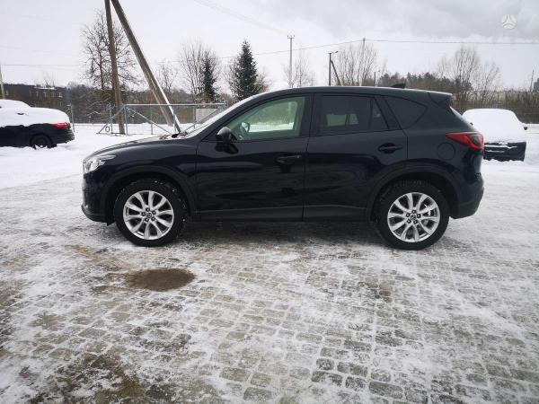 Melns Mazda CX-5 2014 Radviliškis, ar dzinēja tilpumu 2.19 L un nobraukumu 191 tūkst. km par 7850 €, foto 2 vietnē AUTOMOTO.COM.LV