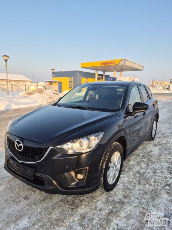 Black Mazda CX-5 2014 in Kretinga, with an engine capacity of 2.20 L and mileage of 260 thousand km for 6900 €, photo 2 on AUTOMOTO.COM.LV
