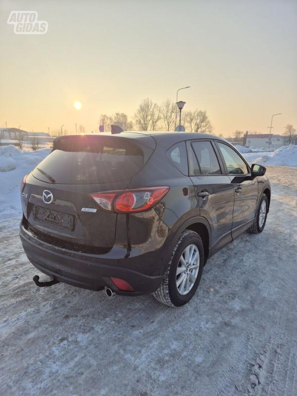 Black Mazda CX-5 2014 in Kretinga, with an engine capacity of 2.20 L and mileage of 260 thousand km for 6900 €, photo 3 on AUTOMOTO.COM.LV