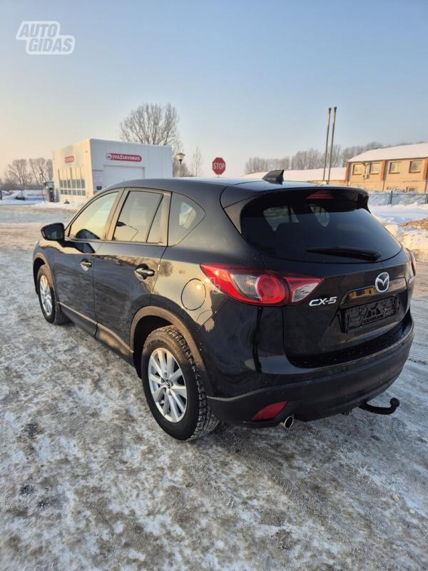 Black Mazda CX-5 2014 in Kretinga, with an engine capacity of 2.20 L and mileage of 260 thousand km for 6900 €, photo 4 on AUTOMOTO.COM.LV