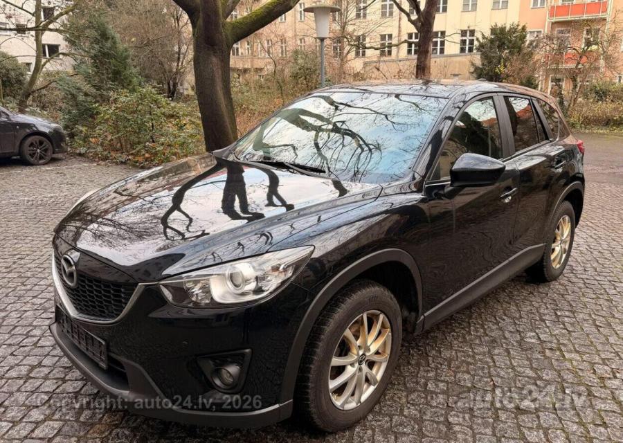 Black Mazda CX-5 2014 in Tartu, with an engine capacity of 2.20 L and mileage of 198 thousand km for 9490 €, photo 1 on AUTOMOTO.COM.LV