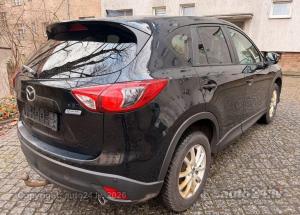 Black Mazda CX-5 2014 in Tartu, with an engine capacity of 2.20 L and mileage of 198 thousand km for 9490 €, photo 4 on AUTOMOTO.COM.LV