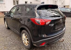 Black Mazda CX-5 2014 in Tartu, with an engine capacity of 2.20 L and mileage of 198 thousand km for 9490 €, photo 5 on AUTOMOTO.COM.LV