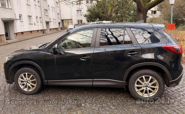 Black Mazda CX-5 2014 in Tartu, with an engine capacity of 2.20 L and mileage of 198 thousand km for 9490 €, photo 6 on AUTOMOTO.COM.LV