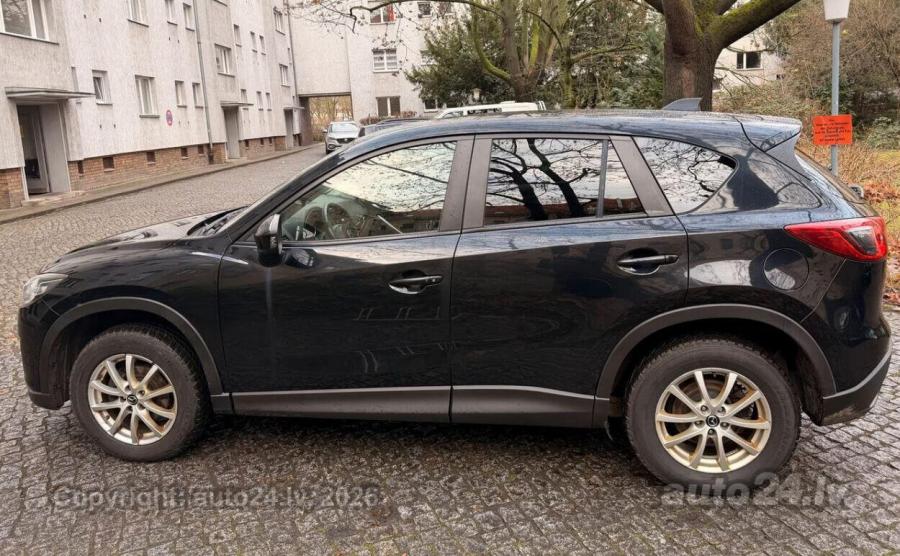 Black Mazda CX-5 2014 in Tartu, with an engine capacity of 2.20 L and mileage of 198 thousand km for 9490 €, photo 6 on AUTOMOTO.COM.LV