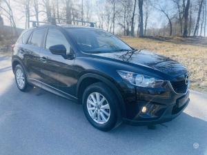 Melns Mazda CX-5 2014 Viļņa, ar dzinēja tilpumu 2.19 L un nobraukumu 210 tūkst. km par 7700 €, foto  vietnē AUTOMOTO.COM.LV