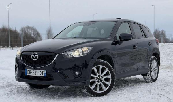 Black Mazda CX-5 2014 in Taurage, with an engine capacity of 2.19 L and mileage of 181 thousand km for 7600 €, photo 1 on AUTOMOTO.COM.LV