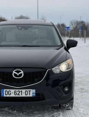 Melns Mazda CX-5 2014 Tauragė, ar dzinēja tilpumu 2.19 L un nobraukumu 181 tūkst. km par 7600 €, foto 4 vietnē AUTOMOTO.COM.LV
