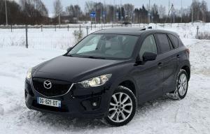 Melns Mazda CX-5 2014 Tauragė, ar dzinēja tilpumu 2.19 L un nobraukumu 181 tūkst. km par 7600 €, foto 5 vietnē AUTOMOTO.COM.LV
