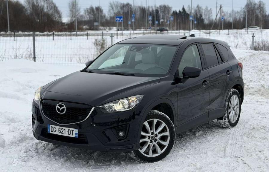 Melns Mazda CX-5 2014 Tauragė, ar dzinēja tilpumu 2.19 L un nobraukumu 181 tūkst. km par 7600 €, foto 5 vietnē AUTOMOTO.COM.LV