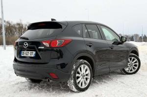 Melns Mazda CX-5 2014 Tauragė, ar dzinēja tilpumu 2.19 L un nobraukumu 181 tūkst. km par 7600 €, foto 14 vietnē AUTOMOTO.COM.LV