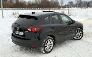 Melns Mazda CX-5 2014 Tauragė, ar dzinēja tilpumu 2.19 L un nobraukumu 181 tūkst. km par 7600 €, foto 18 vietnē AUTOMOTO.COM.LV