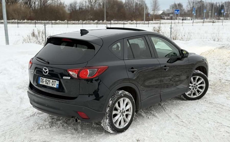 Melns Mazda CX-5 2014 Tauragė, ar dzinēja tilpumu 2.19 L un nobraukumu 181 tūkst. km par 7600 €, foto 18 vietnē AUTOMOTO.COM.LV