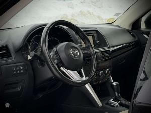Melns Mazda CX-5 2014 Tauragė, ar dzinēja tilpumu 2.19 L un nobraukumu 181 tūkst. km par 7600 €, foto 34 vietnē AUTOMOTO.COM.LV