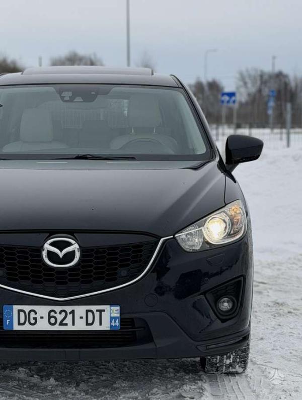 Black Mazda CX-5 2014 in Taurage, with an engine capacity of 2.19 L and mileage of 181 thousand km for 7600 €, photo 4 on AUTOMOTO.COM.LV
