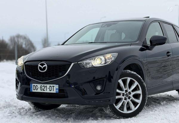 Black Mazda CX-5 2014 in Taurage, with an engine capacity of 2.19 L and mileage of 181 thousand km for 7600 €, photo 6 on AUTOMOTO.COM.LV