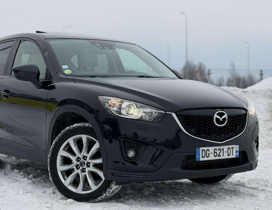 Black Mazda CX-5 2014 in Taurage, with an engine capacity of 2.19 L and mileage of 181 thousand km for 7600 €, photo 8 on AUTOMOTO.COM.LV