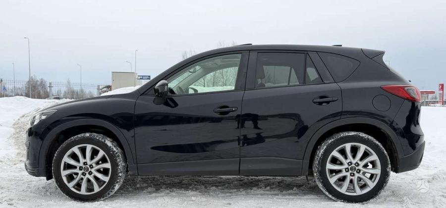Black Mazda CX-5 2014 in Taurage, with an engine capacity of 2.19 L and mileage of 181 thousand km for 7600 €, photo 12 on AUTOMOTO.COM.LV