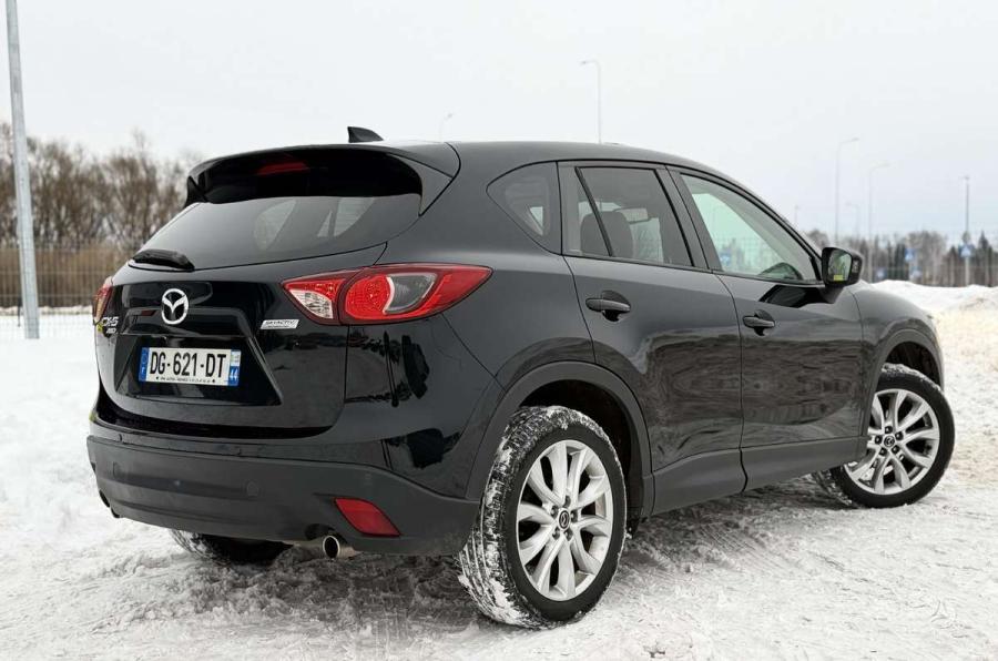 Black Mazda CX-5 2014 in Taurage, with an engine capacity of 2.19 L and mileage of 181 thousand km for 7600 €, photo 14 on AUTOMOTO.COM.LV