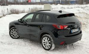 Black Mazda CX-5 2014 in Taurage, with an engine capacity of 2.19 L and mileage of 181 thousand km for 7600 €, photo 17 on AUTOMOTO.COM.LV