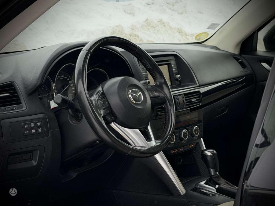 Black Mazda CX-5 2014 in Taurage, with an engine capacity of 2.19 L and mileage of 181 thousand km for 7600 €, photo 34 on AUTOMOTO.COM.LV