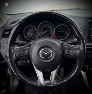 Black Mazda CX-5 2014 in Taurage, with an engine capacity of 2.19 L and mileage of 181 thousand km for 7600 €, photo 36 on AUTOMOTO.COM.LV