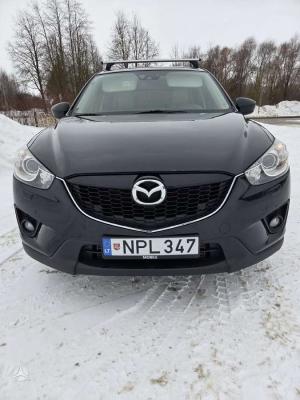 Black Mazda CX-5 2014 in Birzai, with an engine capacity of 2.19 L and mileage of 229 thousand km for 8150 €, photo 3 on AUTOMOTO.COM.LV